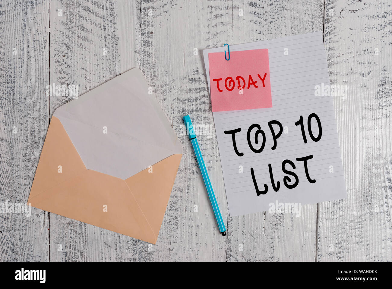 Writing note showing Top 10 List. Business concept for the ten most ...