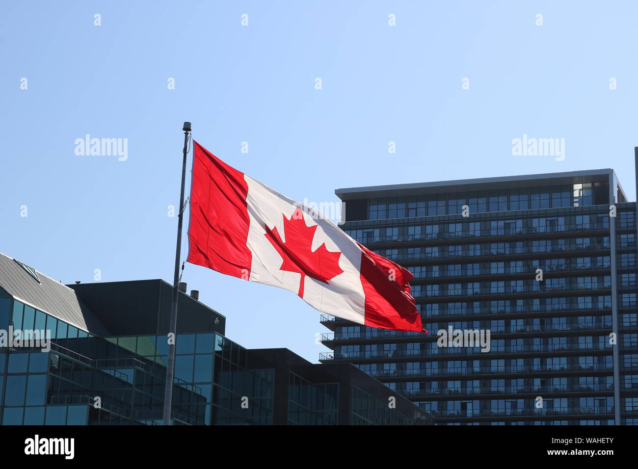Flying canadian flag hi-res stock photography and images - Alamy