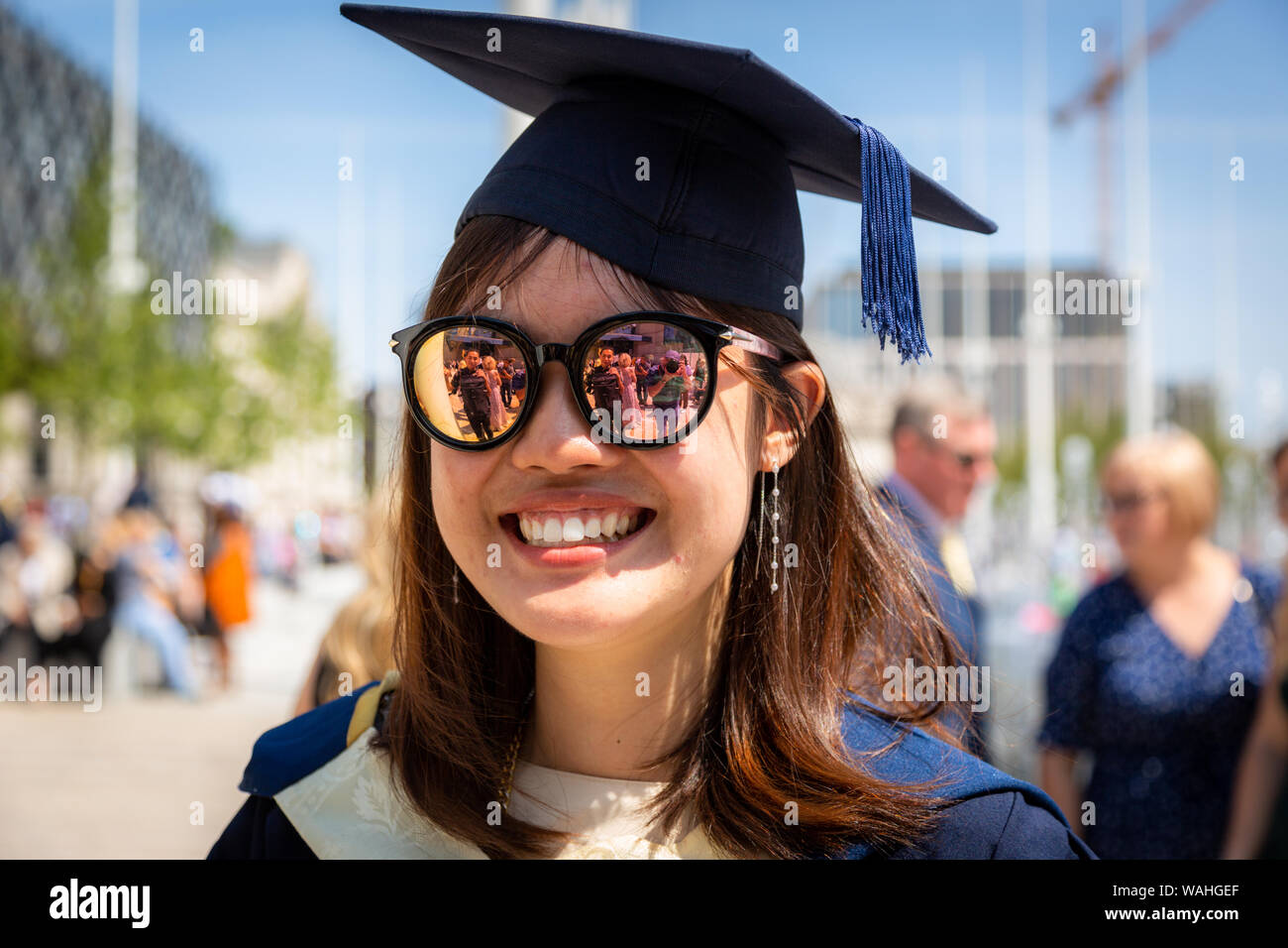 Chinese student wearing graduation cap and gown, Birmingham UK Stock ...