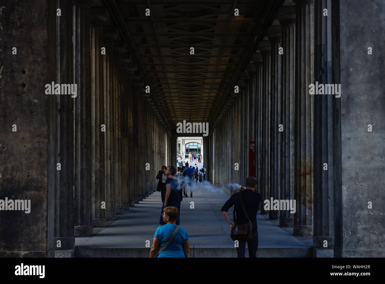 Visitors walk under an architectural structure at the Museum Island in ...