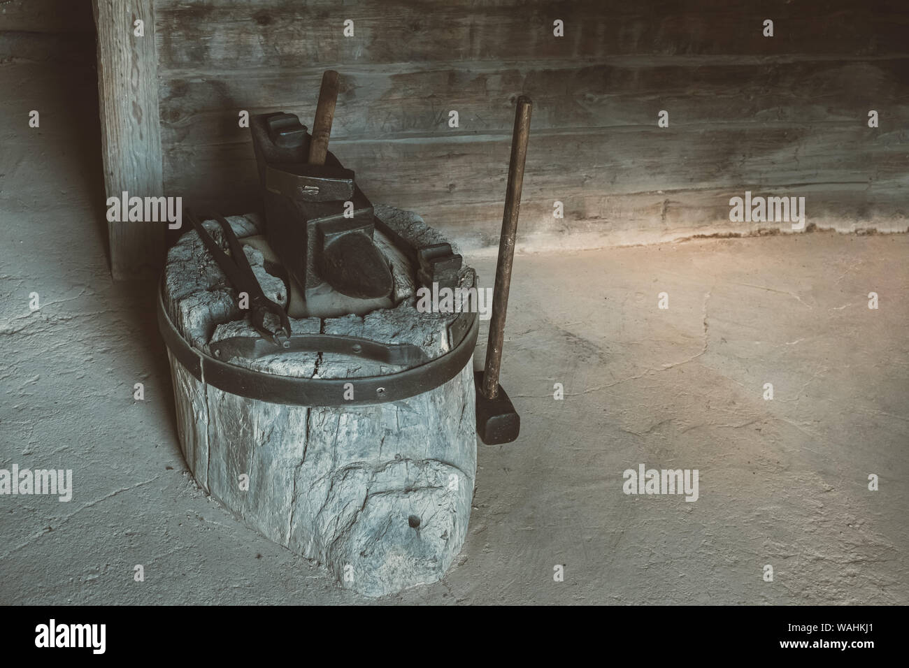 Antique smithy. Retro blacksmithing tools Stock Photo - Alamy