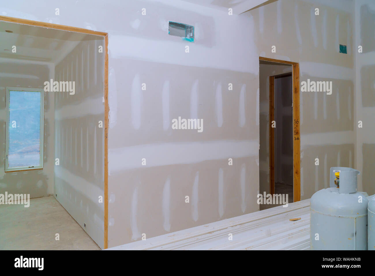 Interior construction of housing with drywall installed door for a new ...