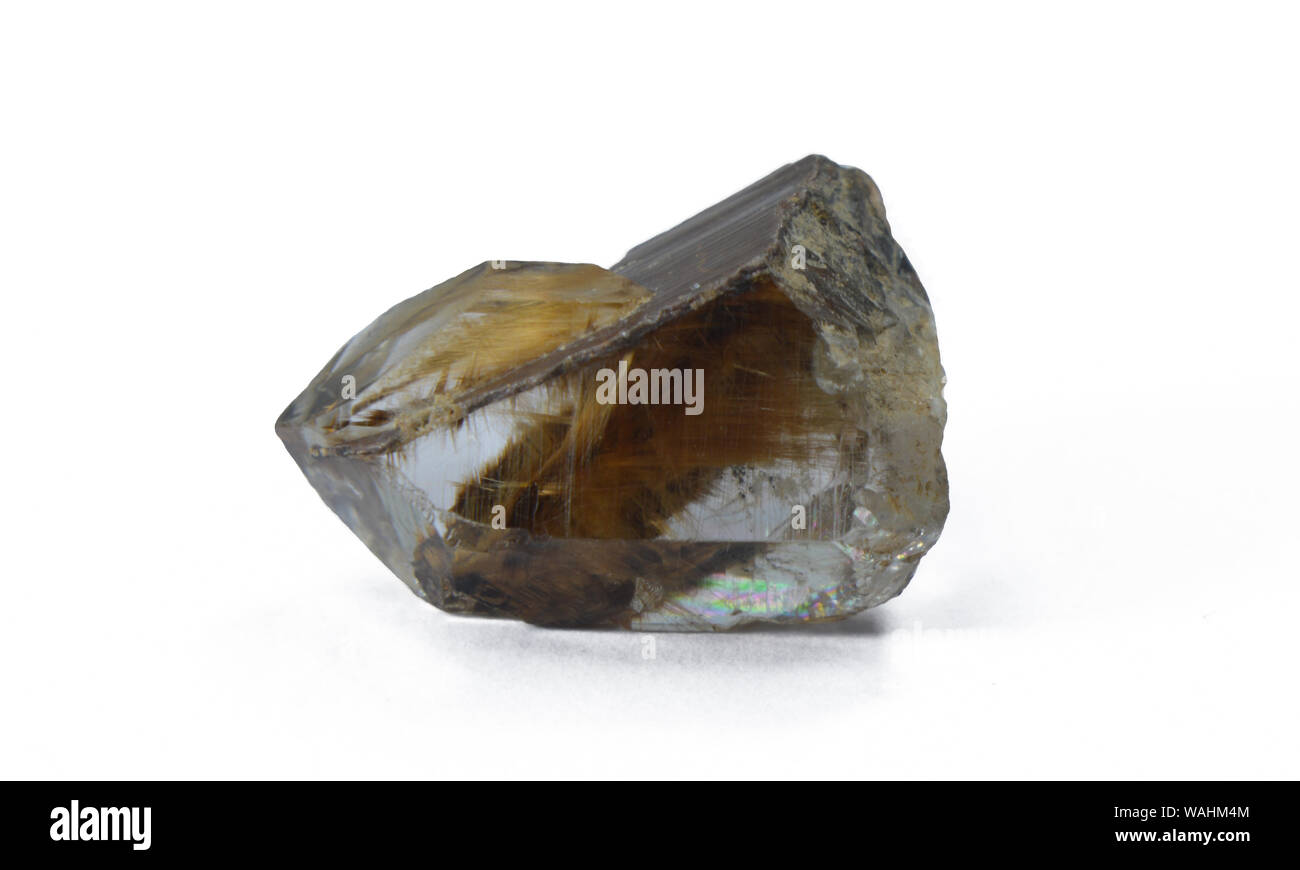 Golden Rutilated quartz crystal, isolated on white background, locality ...