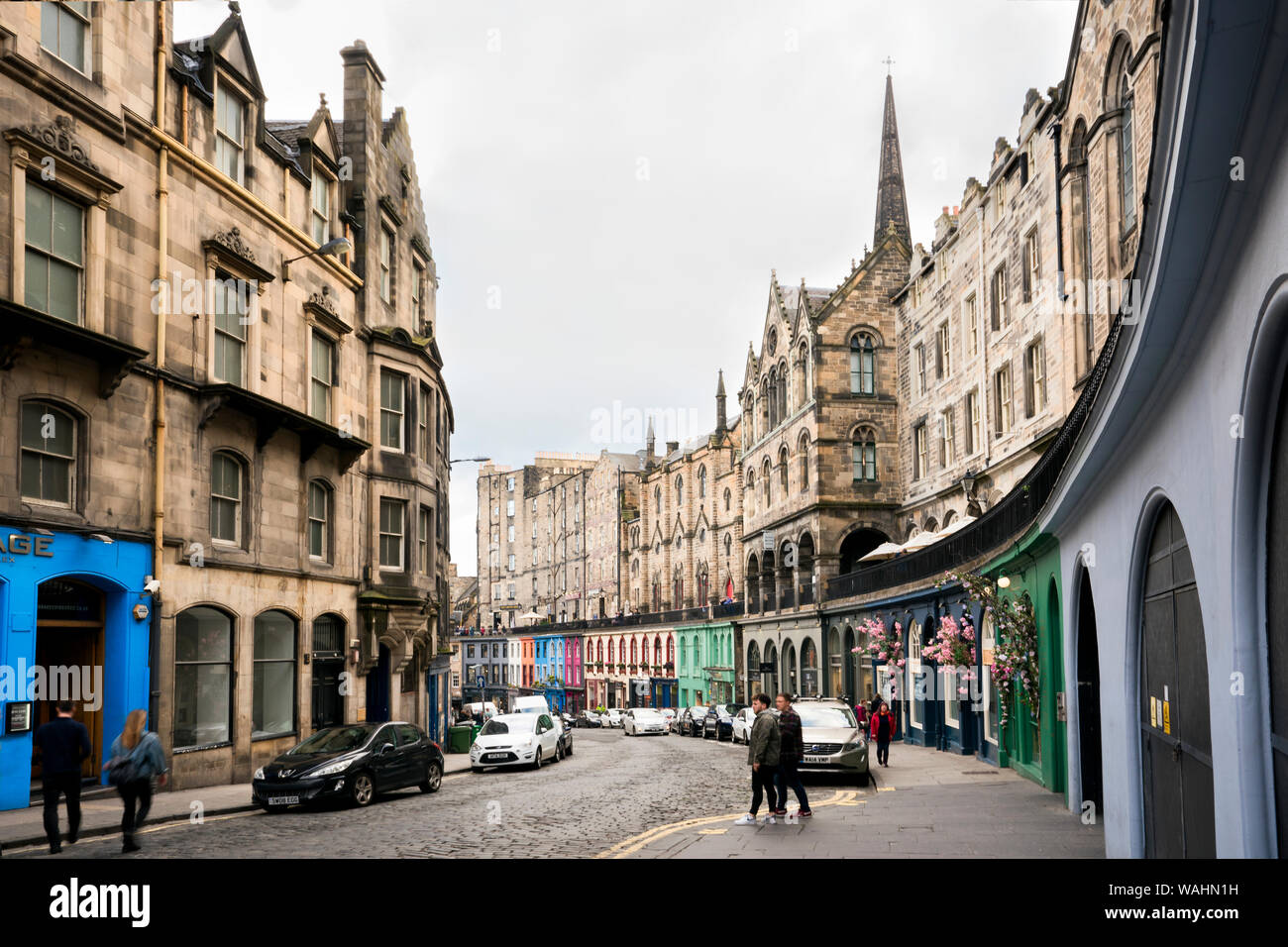 Curved double decker Victoria Street full of shops, bars and ...