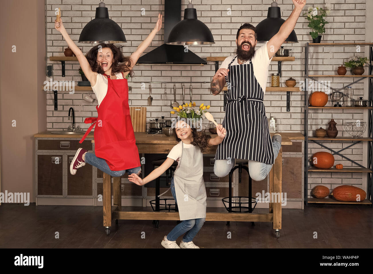 Prepare delicious meal. Breakfast time. Family having fun cooking ...