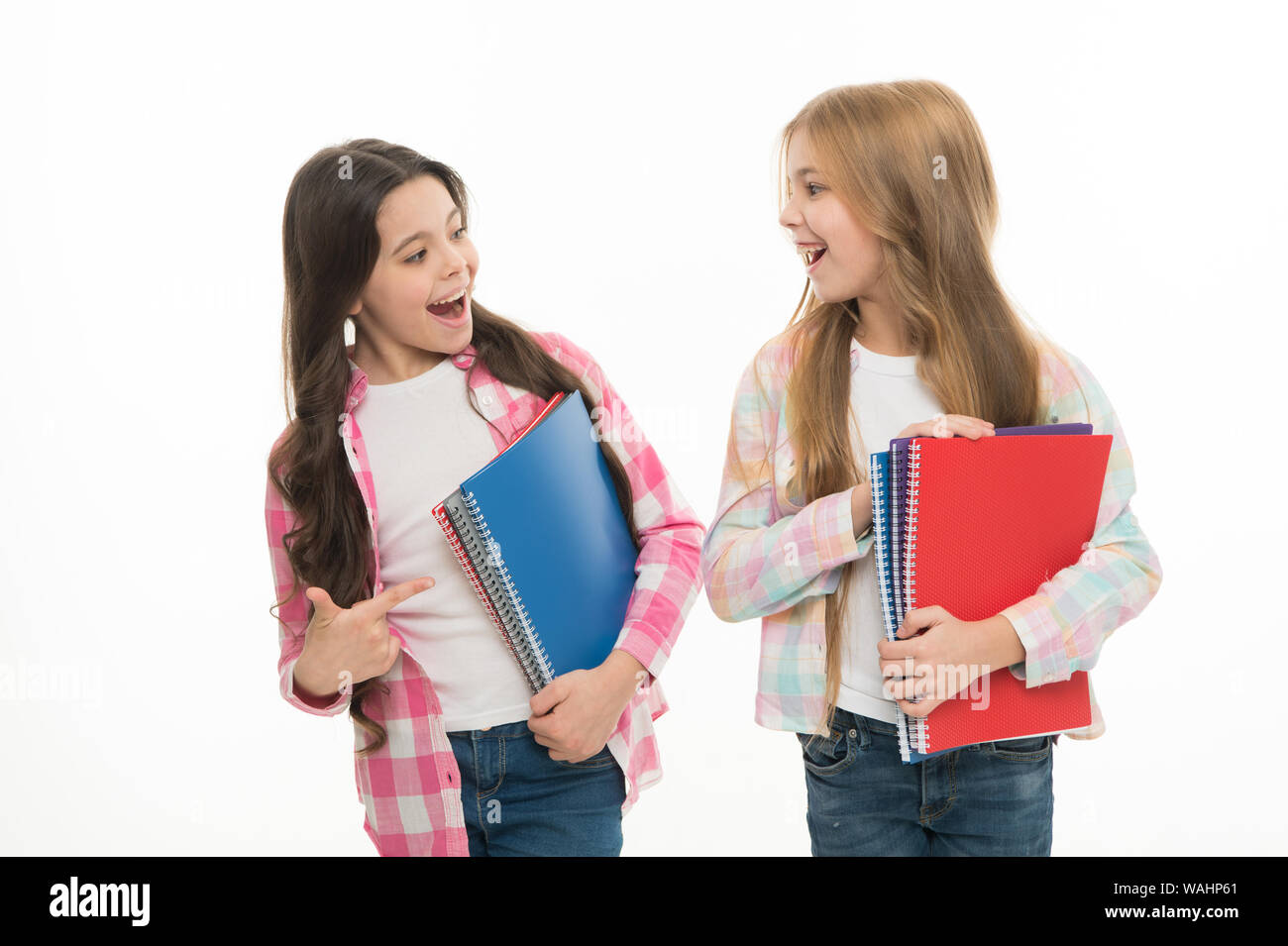 Happy to be students. Girls with school textbooks white background ...