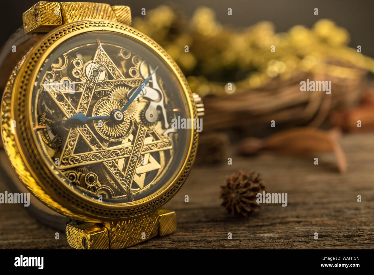 Vintage skeleton watch with Star of David on wood background Stock ...