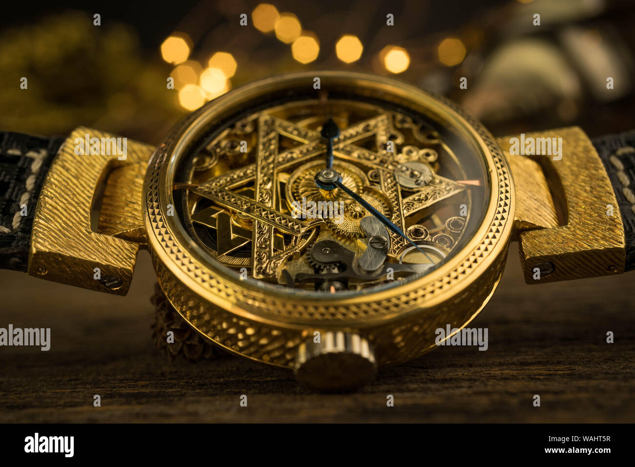 Vintage skeleton watch with Star of David on wood background Stock ...