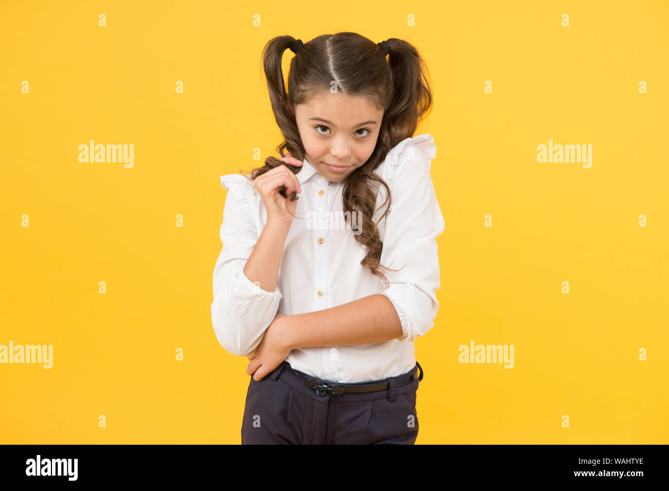 Shy schoolgirl hi-res stock photography and images - Alamy