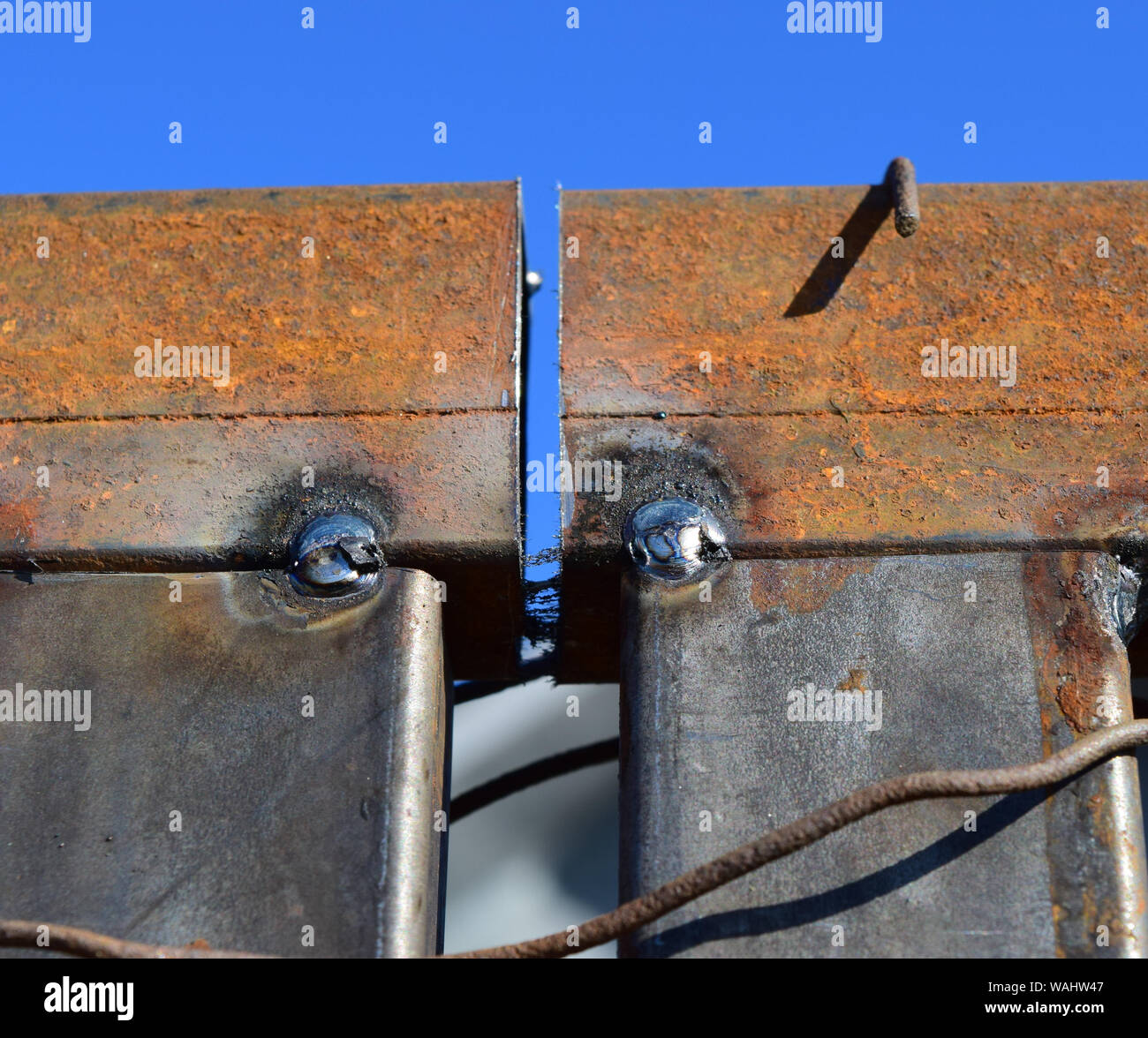 Connection by welding of metal square pipes. Welding seam Stock Photo ...