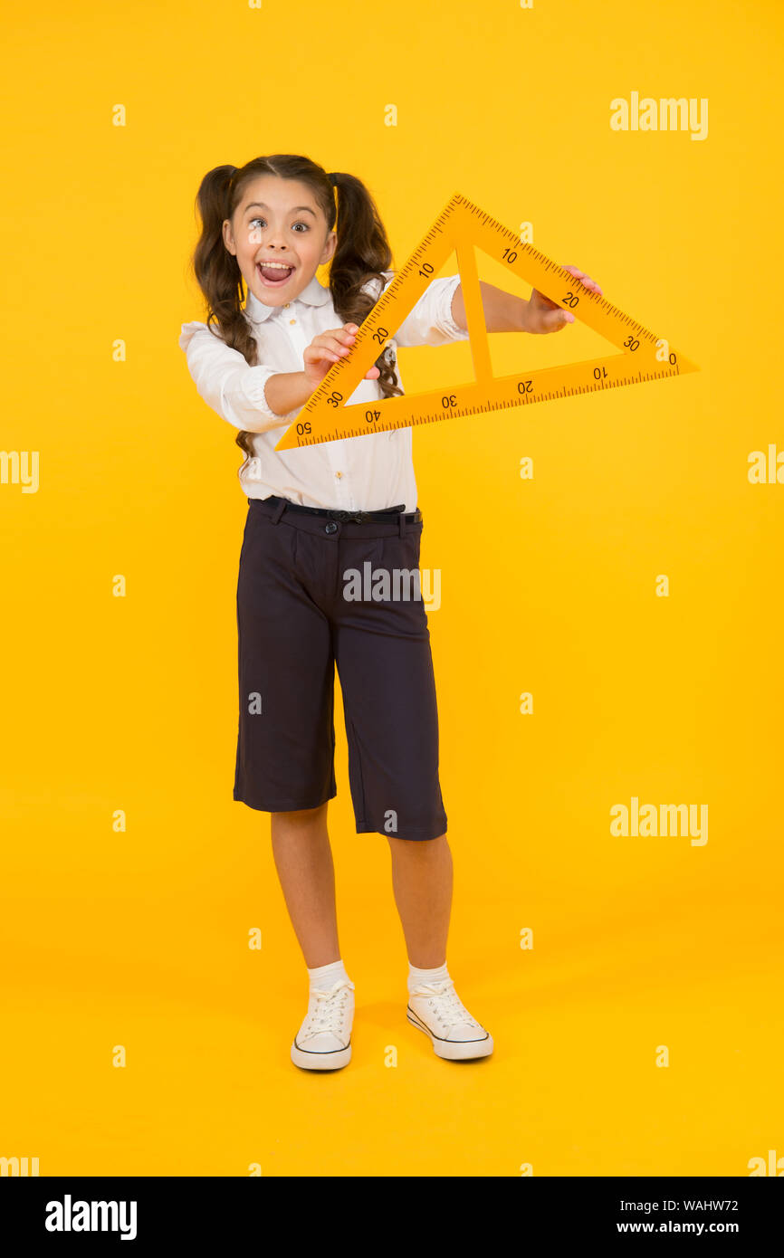 I learn geometry easily. Adorable little child learns geometry in ...