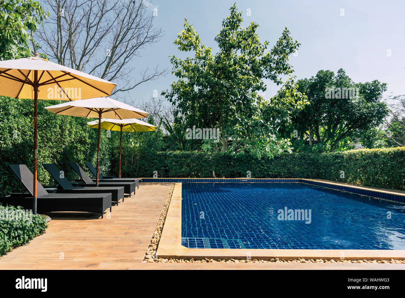 Beside swimming pool hi-res stock photography and images - Alamy