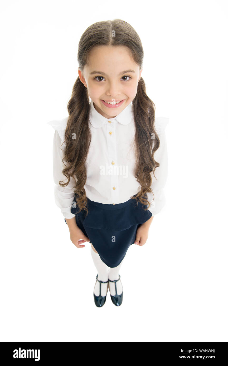 Cheerful smile. Girl cute pupil on white background. School uniform ...