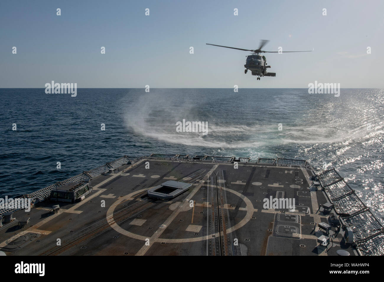 190819-N-RH019-0008 EAST CHINA SEA (August 19, 2019) An MH-60R Sea Hawk ...