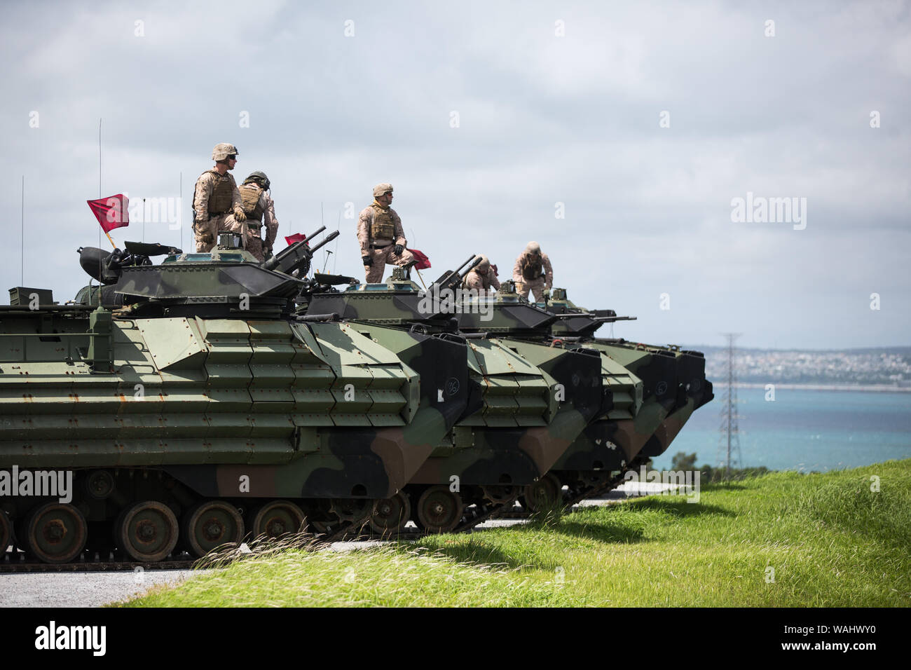 U.S. Marines with 4th Marine Regiment, 3rd Marine Division, conduct ...