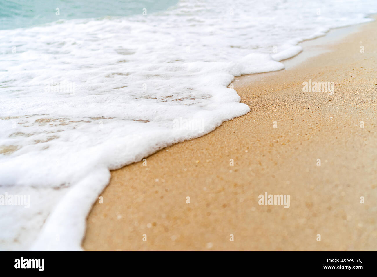 Background of Wave on Sand Beach Stock Photo - Alamy