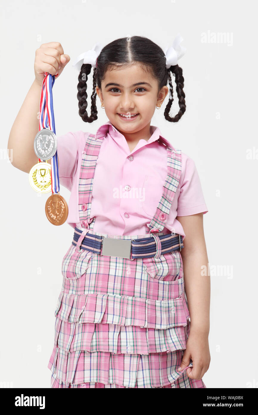 Girl and medals hi-res stock photography and images - Alamy