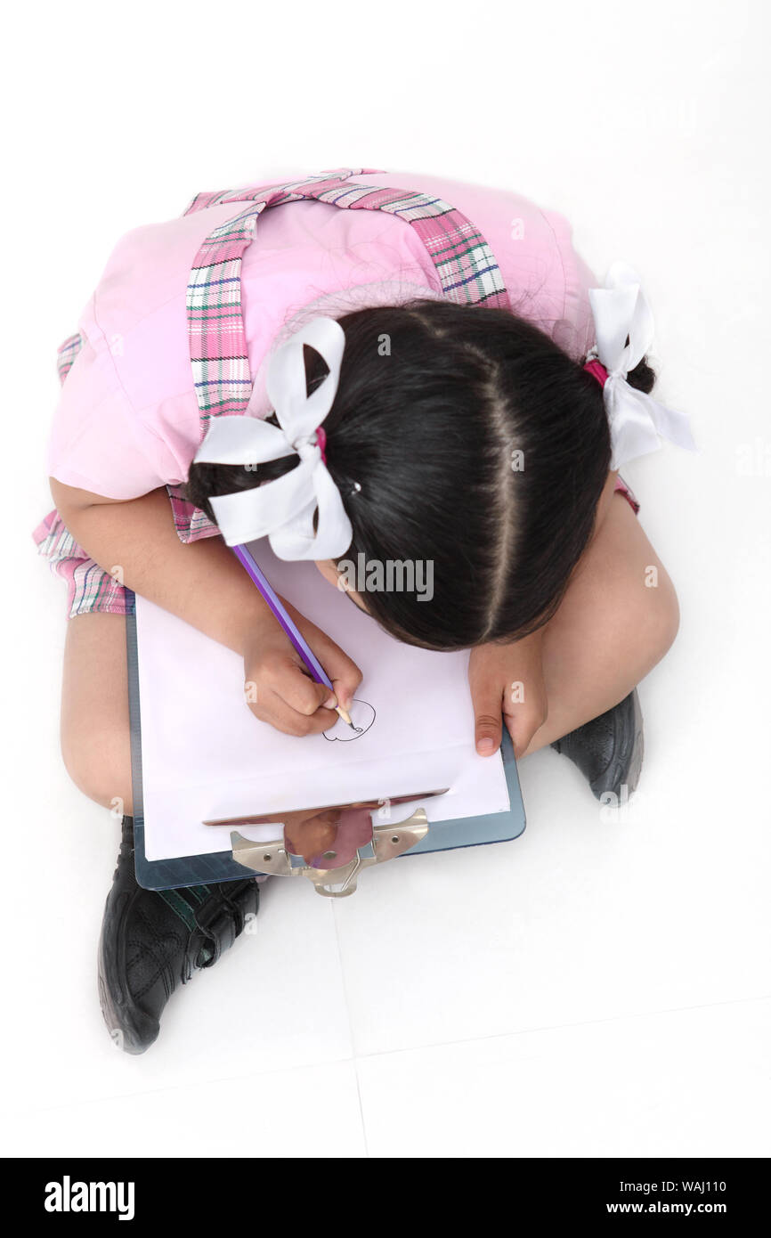 Indian girl child education drawing Cut Out Stock Images & Pictures - Alamy