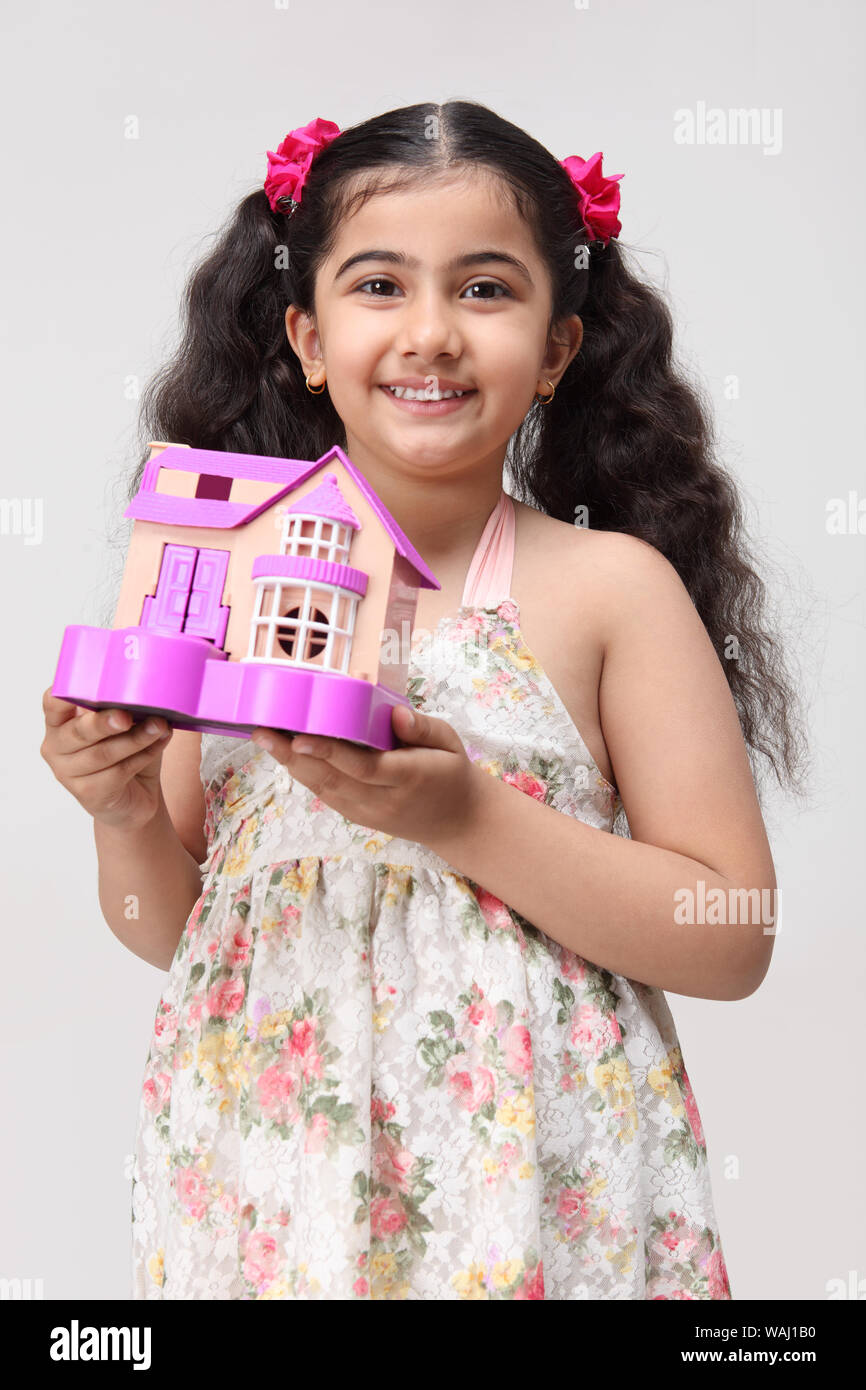 Girl showing her dream home Stock Photo - Alamy