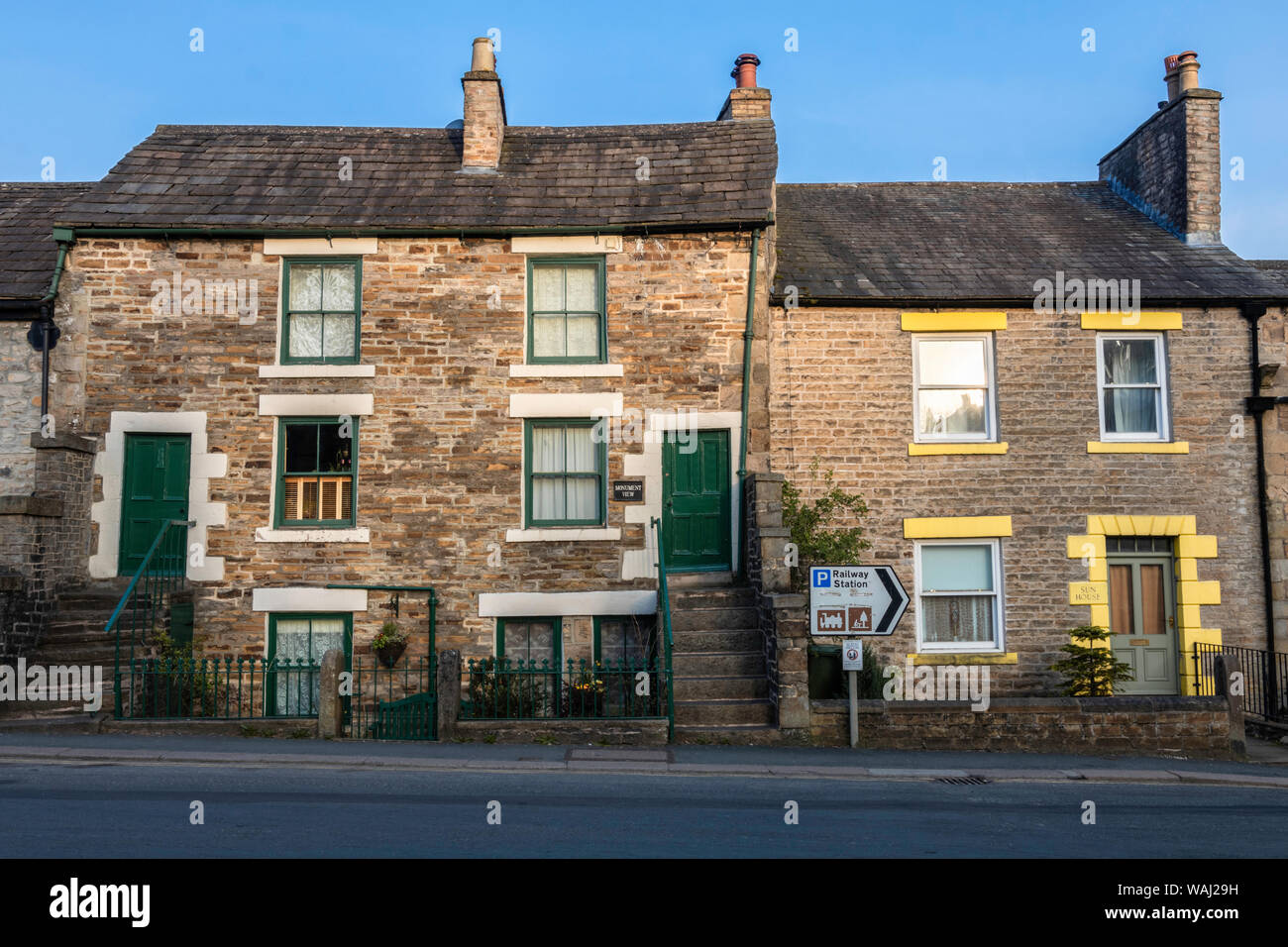 Alston green and yellow contrast neighbourhood. old brick houses Stock ...