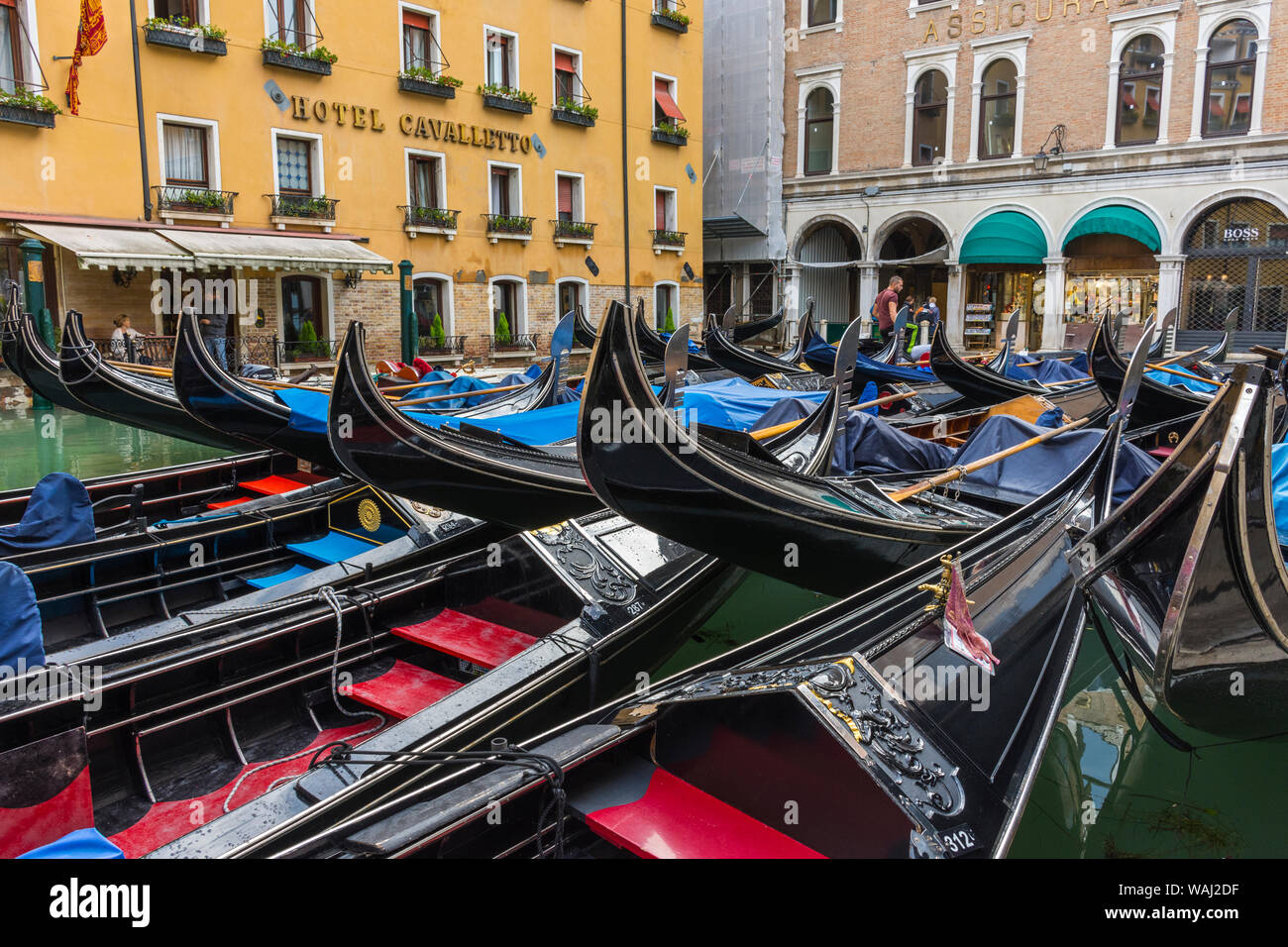 Gondolas at the Bacino Orseolo on the Rio Orseolo canal, Venice, Italy ...
