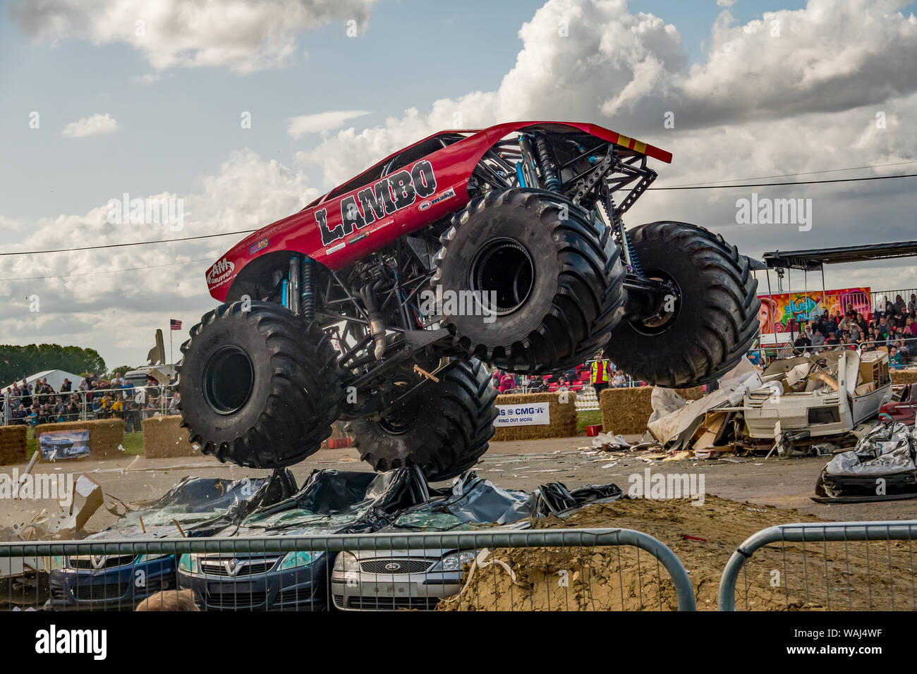 Monster truck crushing cars hi-res stock photography and images - Alamy