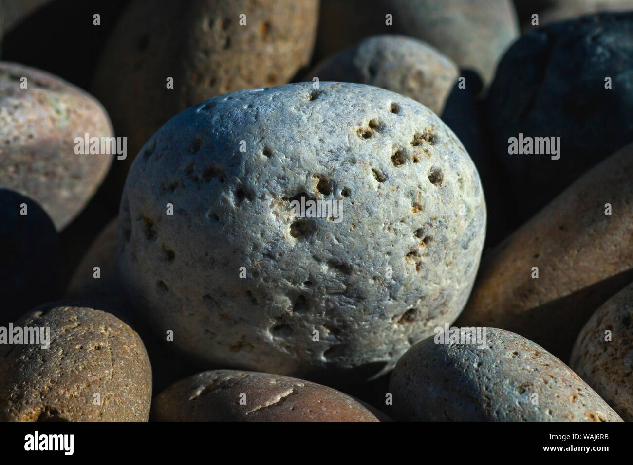 Polished river rocks Stock Photo - Alamy