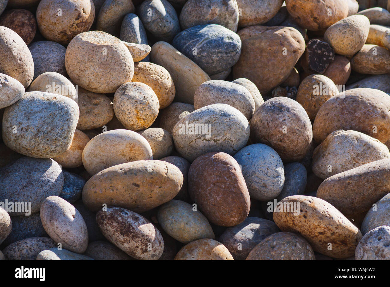 Polished river rocks Stock Photo - Alamy