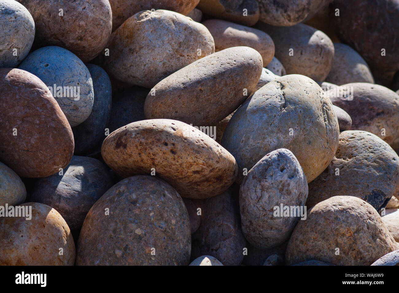 Polished river rocks Stock Photo - Alamy