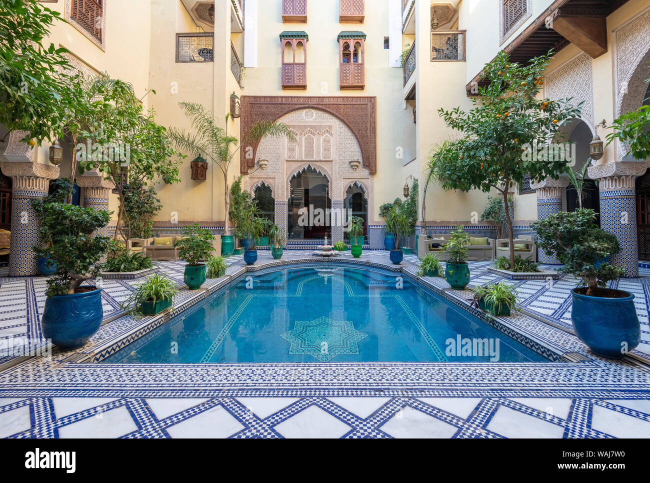 Africa, Morocco, Fes. Fountain and pool at Riad Salam Fes Hotel. Credit ...