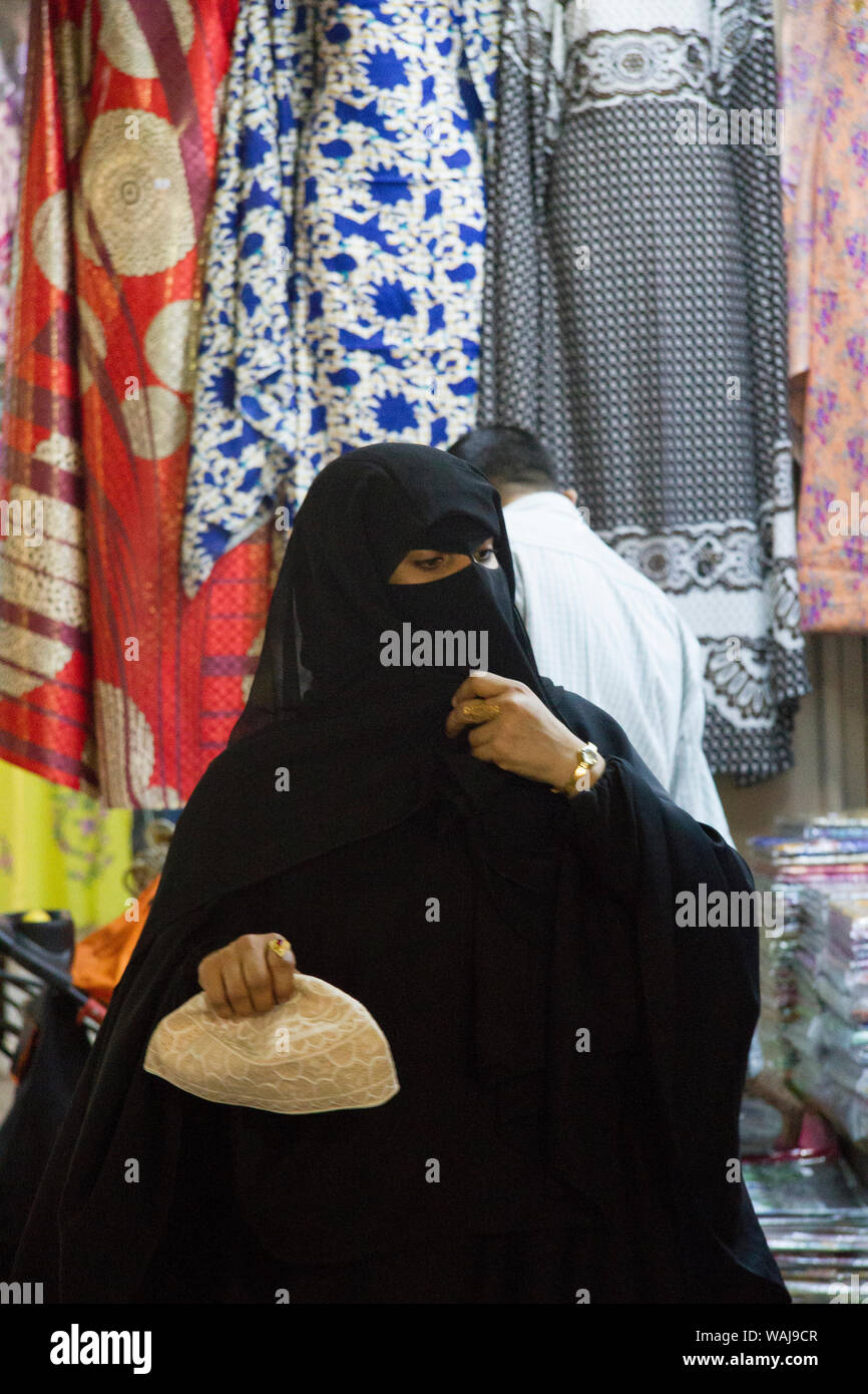 Woman in Mutrah Souq, old-fashioned bazaar. Muscat, Oman Stock Photo ...