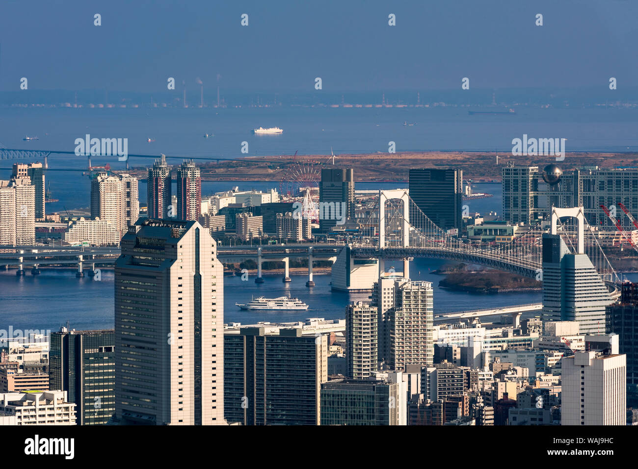 View of Tokyo Bay and boats along with bridges and skyscrapers Stock ...