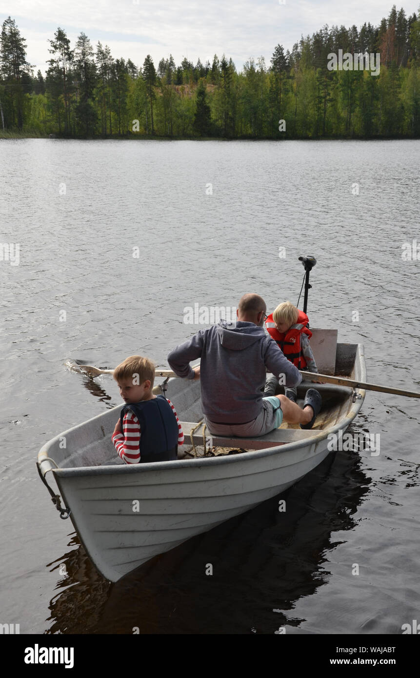Father and children on rowing boat hi-res stock photography and images ...