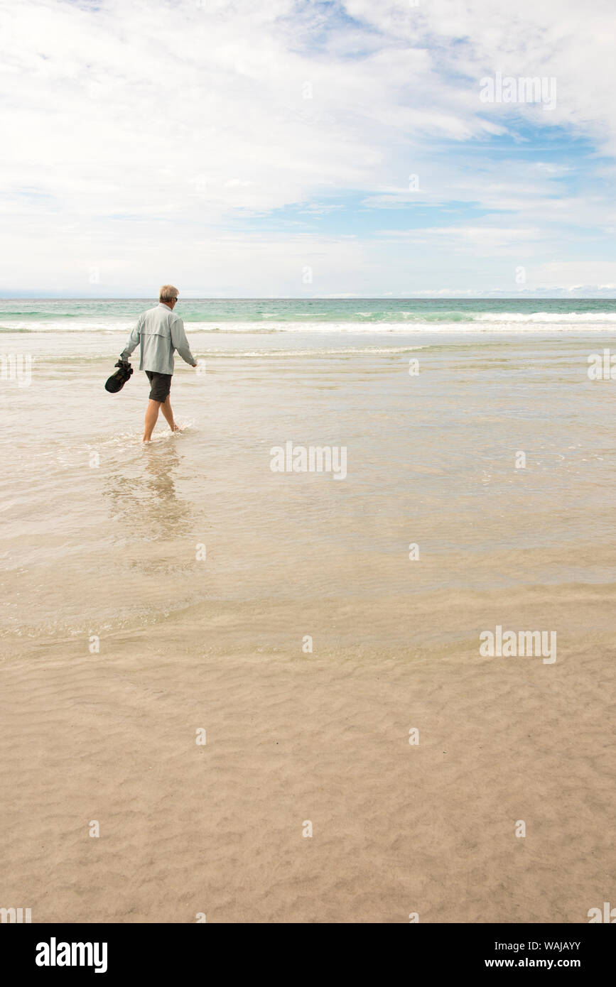 Australia, Tasmania, Denison Beach conservation area. Man on beach. (MR ...
