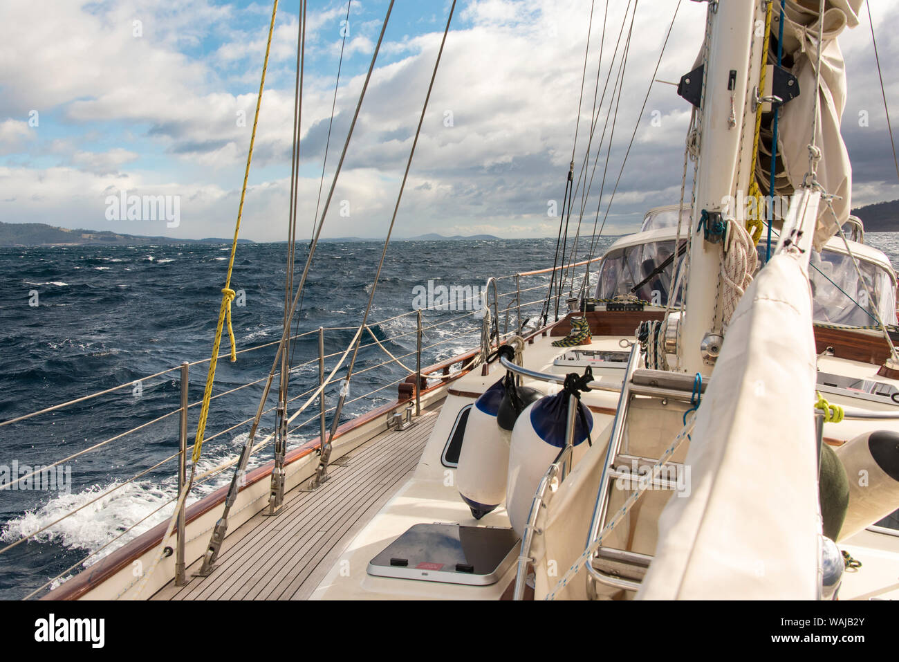 Australia, Tasmania. Ship underway in rough seas through Mercury ...