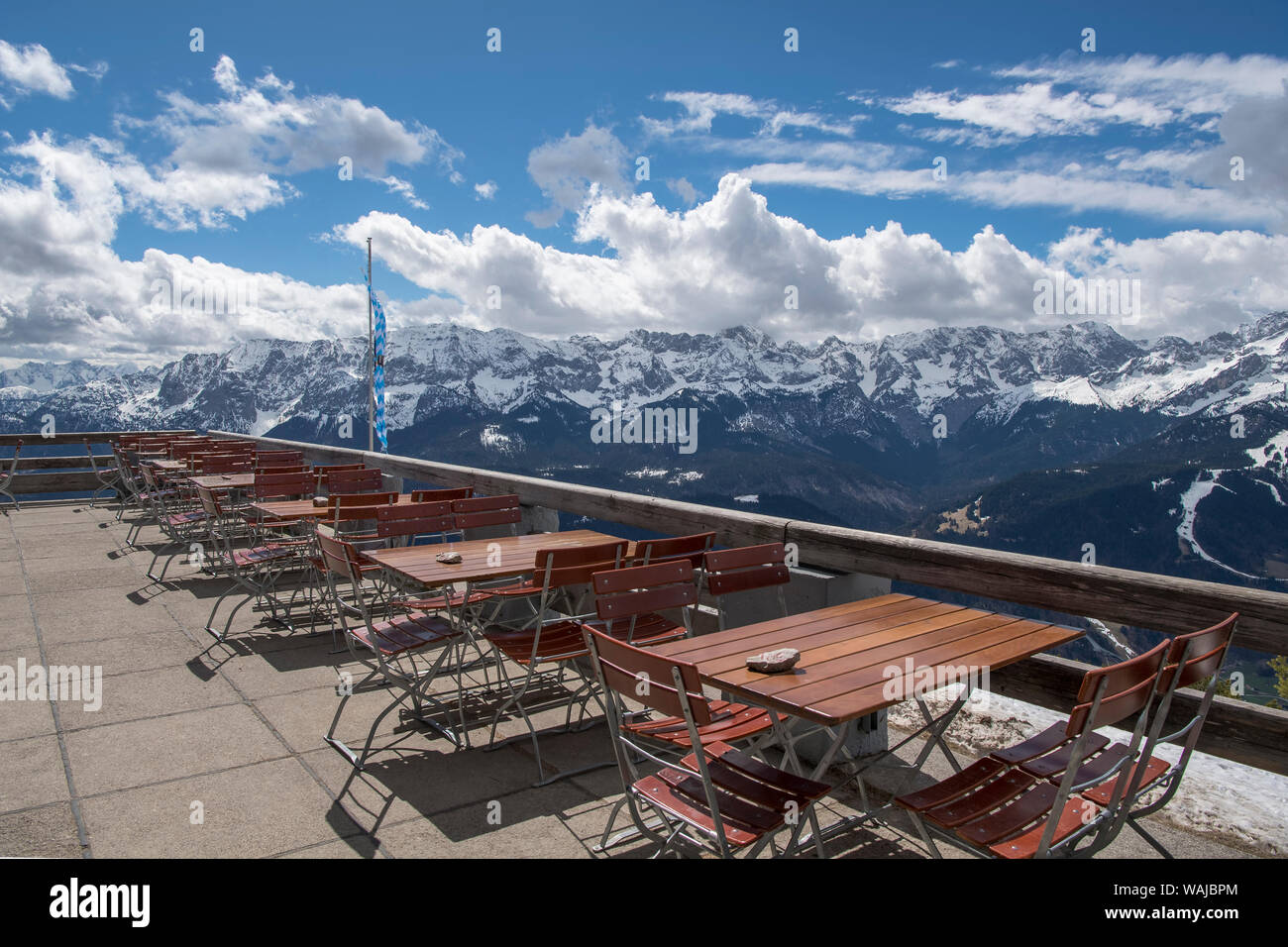 Restaurant patio overlooking the snow-covered Bavarian Alps Stock Photo ...
