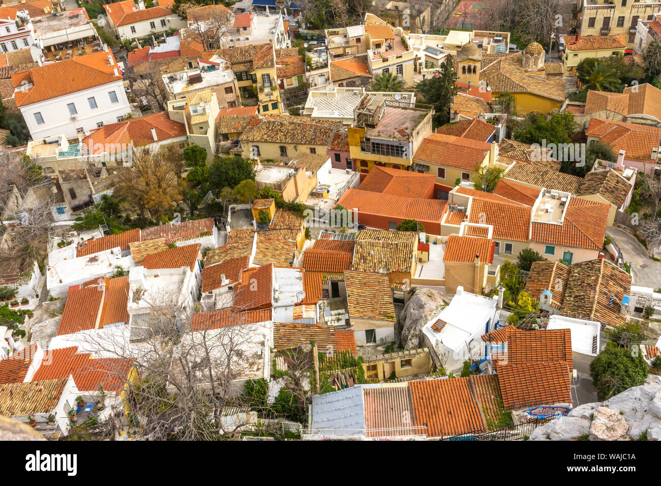 Orange roofs and white buildings. Ancient Greek neighborhoods from ...