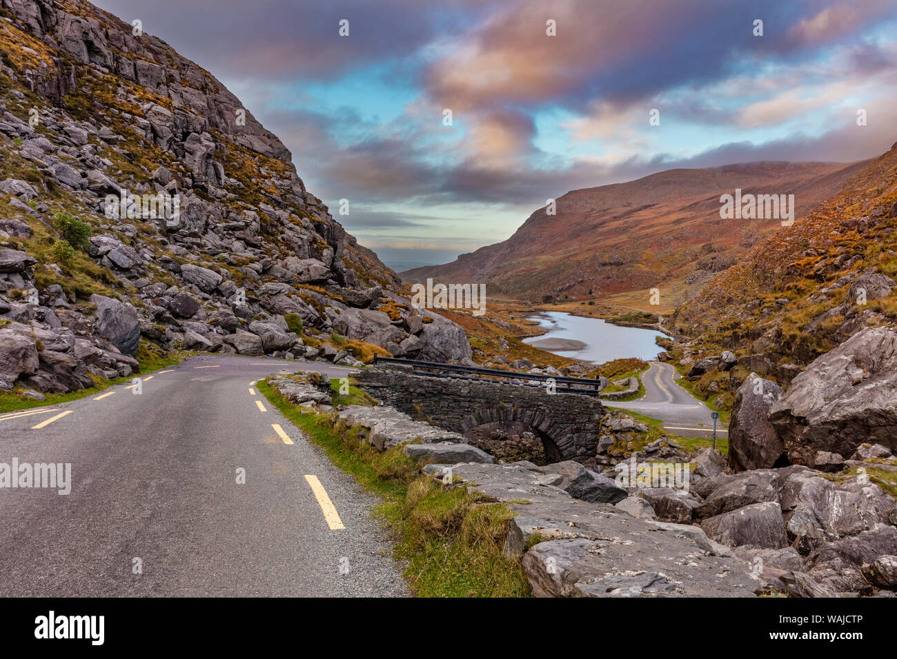 Narrow roadway over stone bridge at the Gap of Dunloe near Killarney ...
