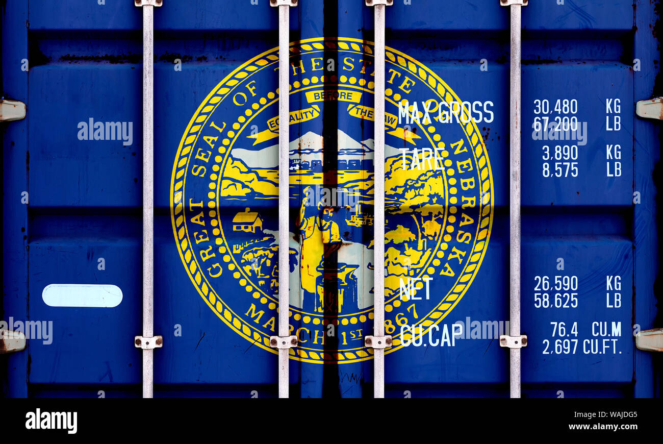 The national flag of the US state Nebraska in a container doors on the ...