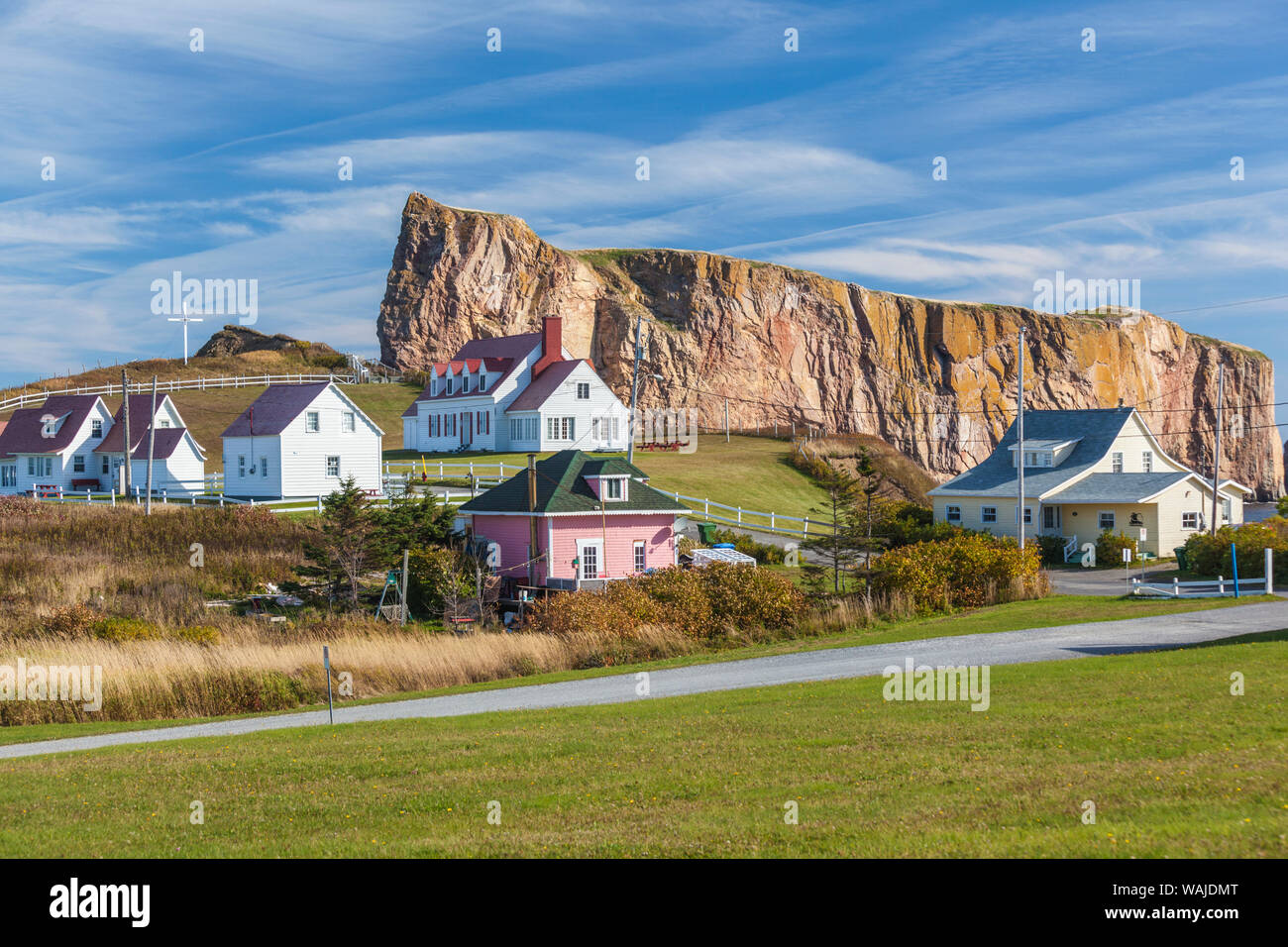Canada, Quebec, Perce. Village buildings and Perce Rock Stock Photo - Alamy