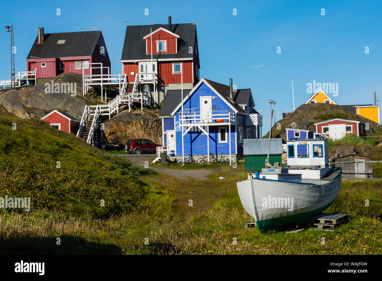 Greenland. Sisimiut. Fishing boat and colorful houses Stock Photo - Alamy