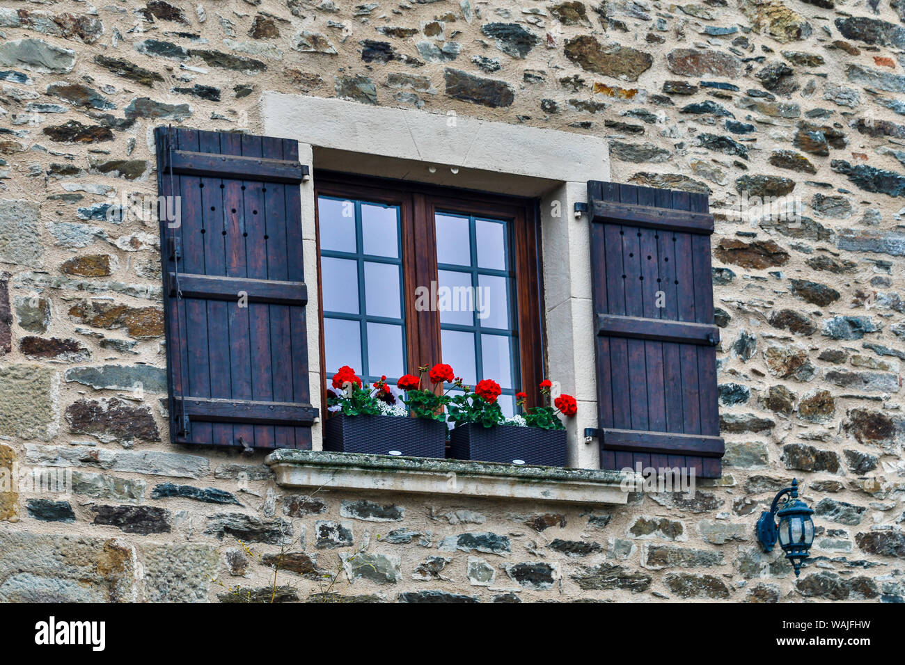 France, Najac. Blue window shutters and flower box Stock Photo - Alamy