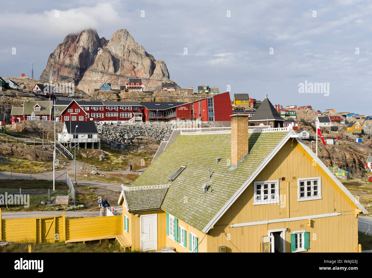 Small town of Uummannaq, northwest Greenland. Old house in typical ...