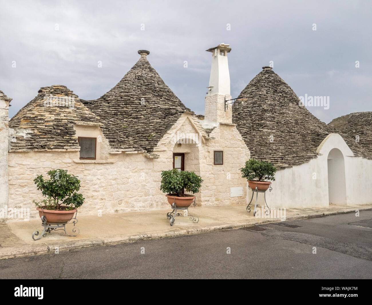 Italy, Alberobello. Typical trulli houses in Alberobello Stock Photo ...