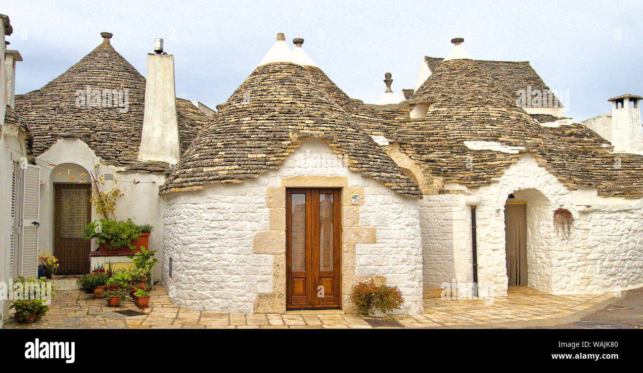 Italy, Alberobello. A typical trulli house with its conical shaped ...
