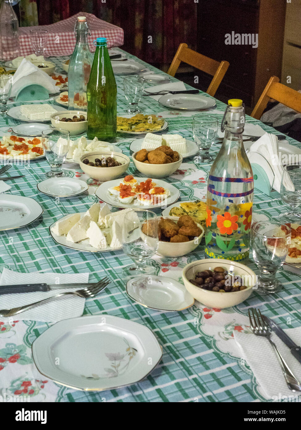 Italy, Alberobello. Lunch is being served at a local farmhouse with ...