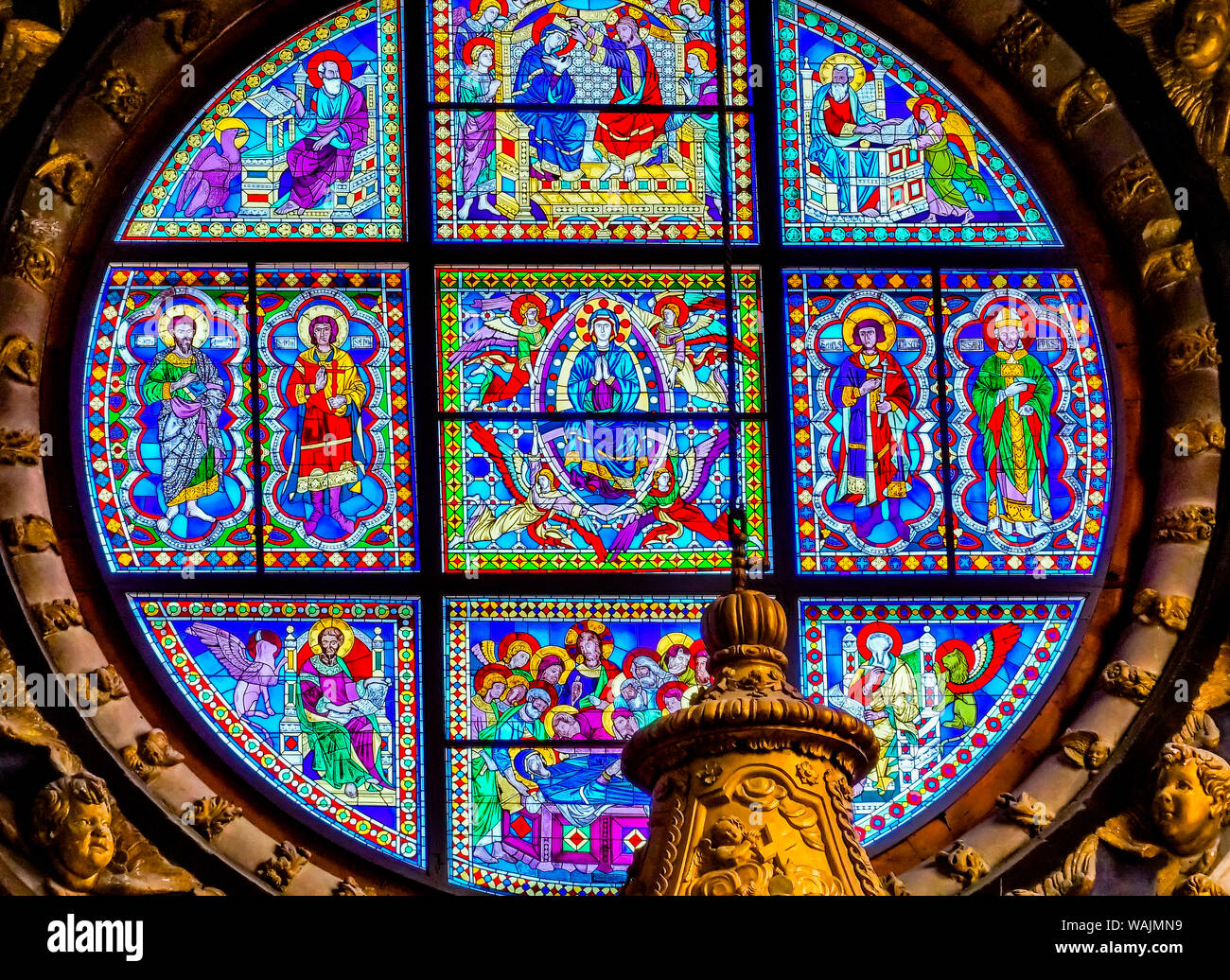 Virgin Mary and Saints rose window stained glass, Siena, Italy ...
