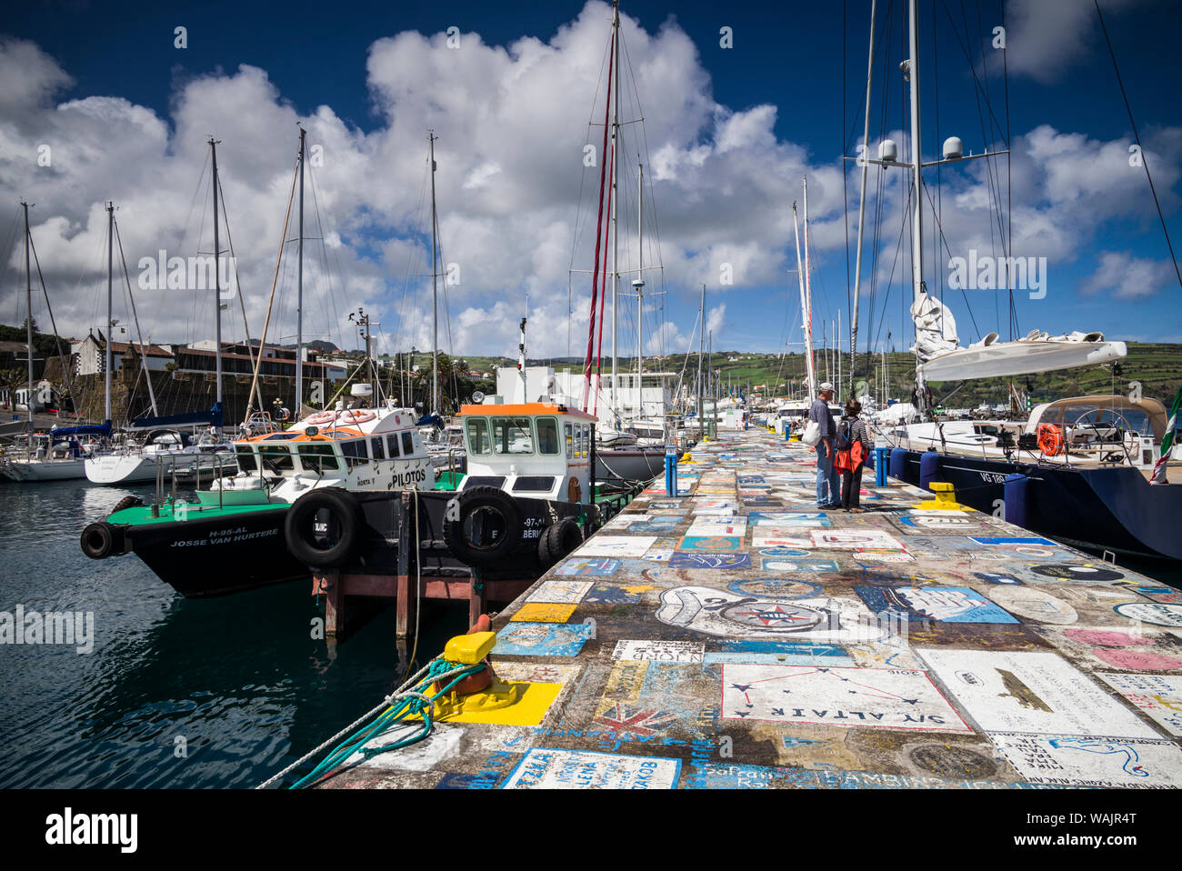 Portugal, Azores, Faial Island. Horta Marina with paintings by yacht ...