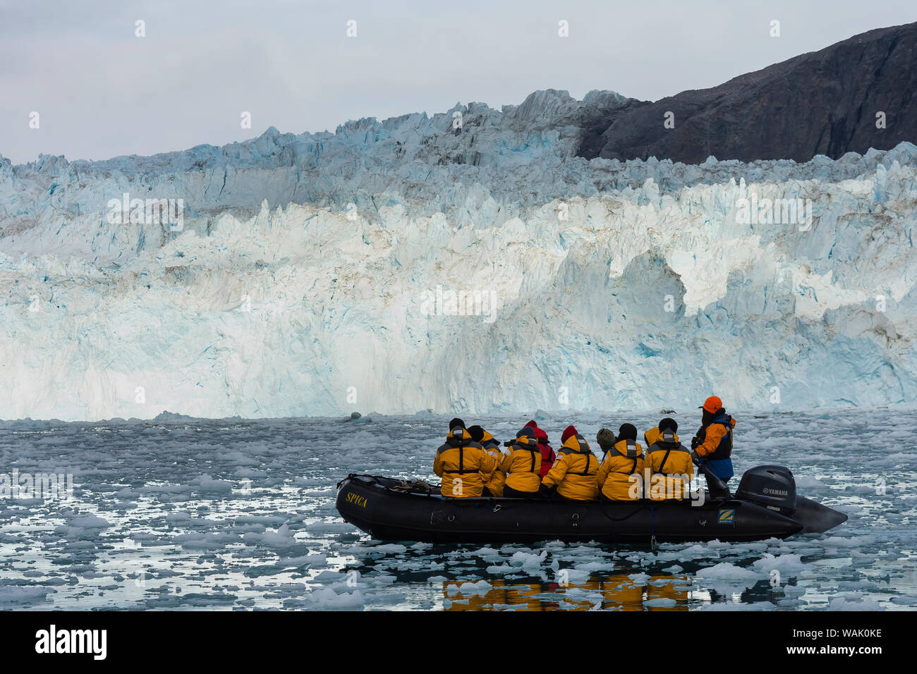Greenland, Eqip Sermia. Zodiac cruising through brash ice Stock Photo - Alamy