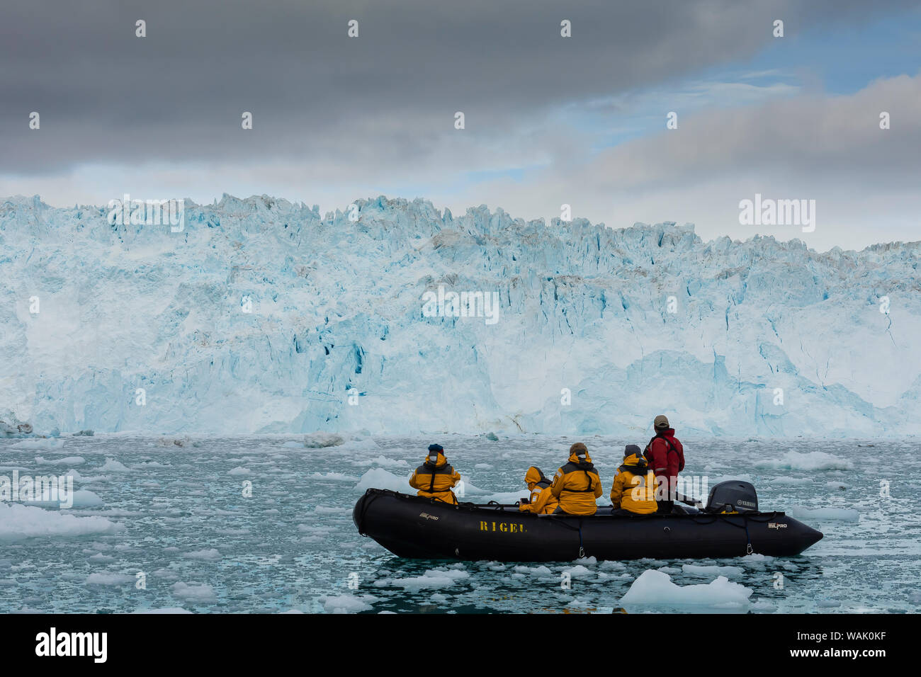 Greenland, Eqip Sermia. Zodiac cruising through brash ice Stock Photo - Alamy